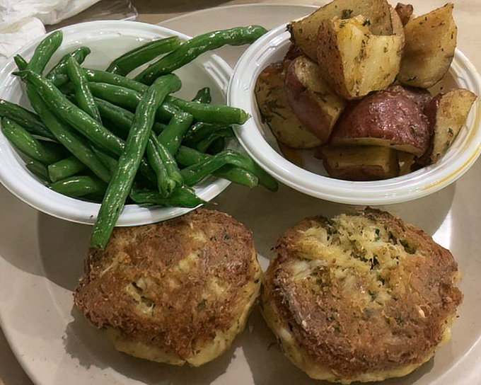 Golden-brown crab cakes that could make a Marylander weep with joy. These beauties are what minimal intervention looks like—just enough binding to keep the sweet lumps together.