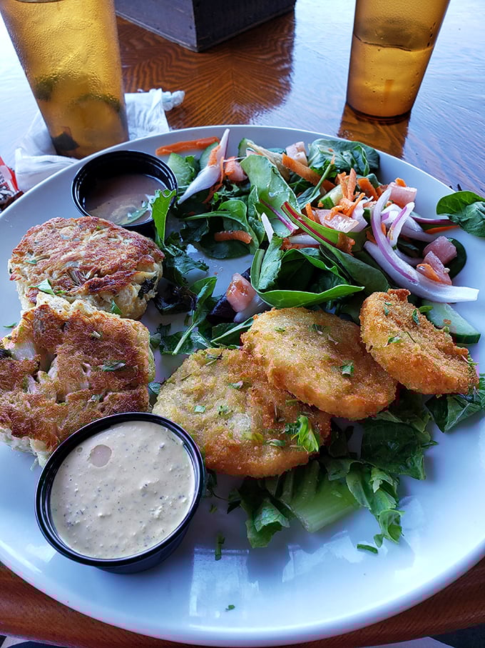These aren't just crab cakes; they're edible evidence that sometimes the simplest pleasures – golden-brown perfection with minimal filler – are life's greatest luxuries.