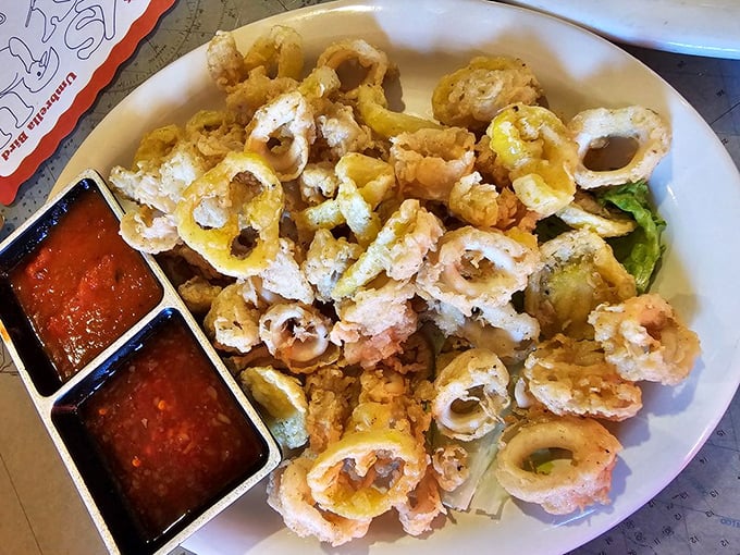 The holy grail of calamari—golden, crispy rings that shatter between your teeth without a hint of rubber tire chewiness.
