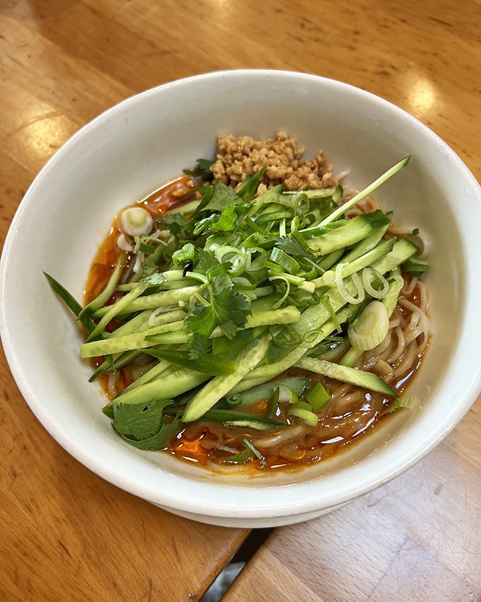 Dan dan noodles that make time stand still – the perfect balance of nutty, spicy, and savory with fresh cucumber providing the cool counterpoint.