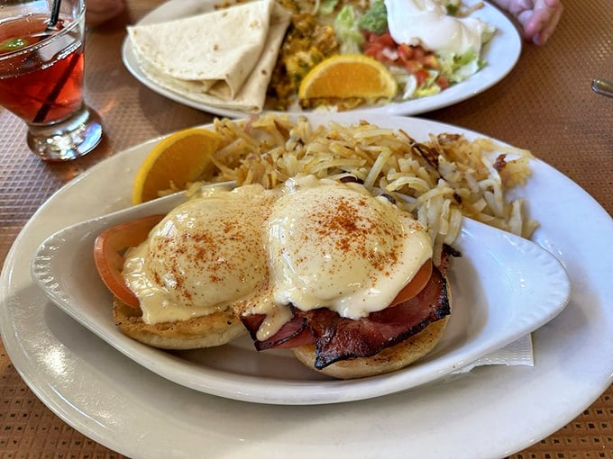 Eggs Benedict done right – when hollandaise meets hash browns, magic happens on your plate.
