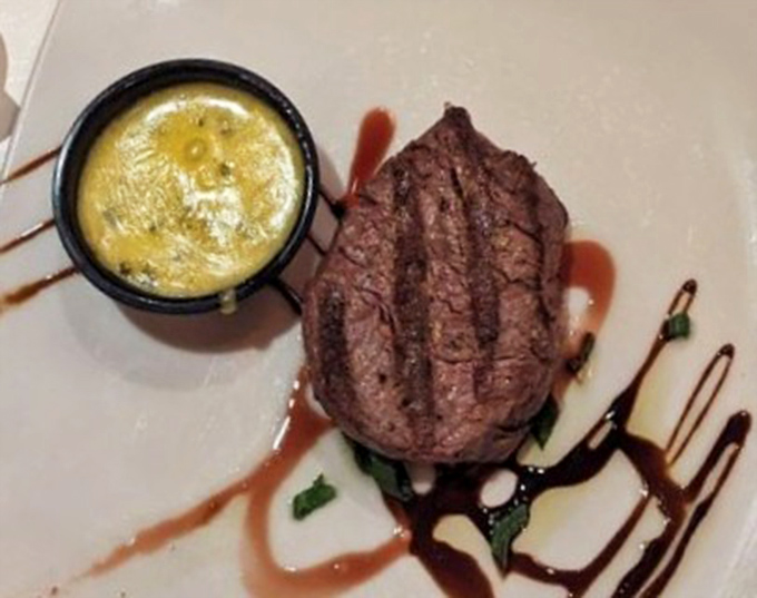 This filet mignon doesn't just melt in your mouth—it performs a full Broadway musical there, with a side of compound butter stealing scenes.