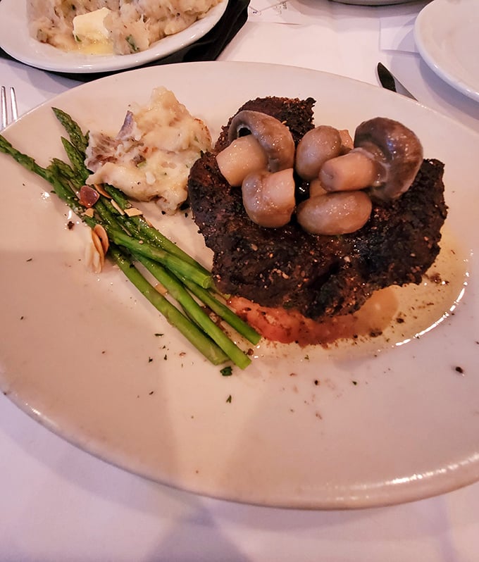This isn't just steak—it's a masterpiece with mushrooms. The kind of dish that makes you consider selling your vacation timeshare for just one more bite.