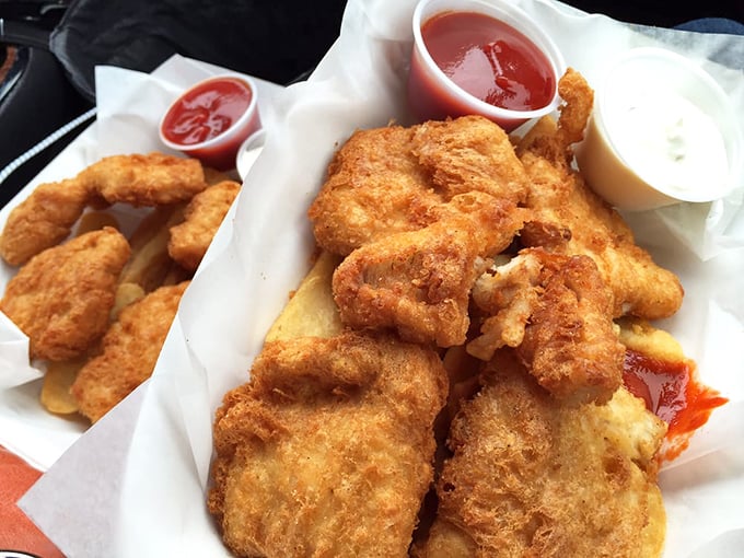 The main event arrives in a humble paper basket, but don't be fooled – this is seafood royalty disguised as casual fare.
