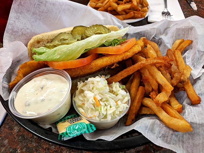 Not all heroes wear capes—some come wrapped in crispy batter with perfect fries. This fish sandwich is Midwestern comfort on a plate.
