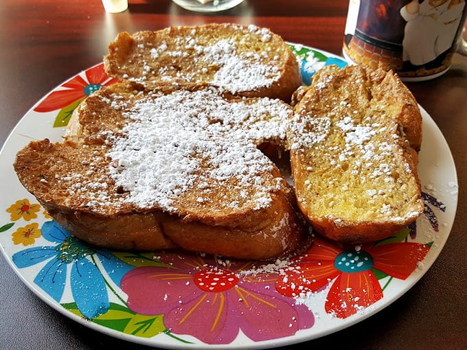 Golden-brown perfection dusted with powdered sugar – this French toast doesn't need a fancy Instagram filter. It's the breakfast equivalent of finding money in your pocket.