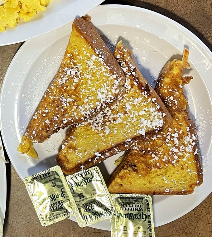 This French toast isn't just breakfast – it's a powdered sugar-dusted revelation that makes you wonder why you'd ever settle for lesser versions.