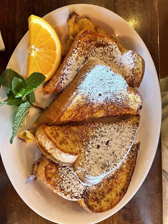 Golden, caramelized perfection dusted with powdered sugar – this is why people drive across town before 9 AM.