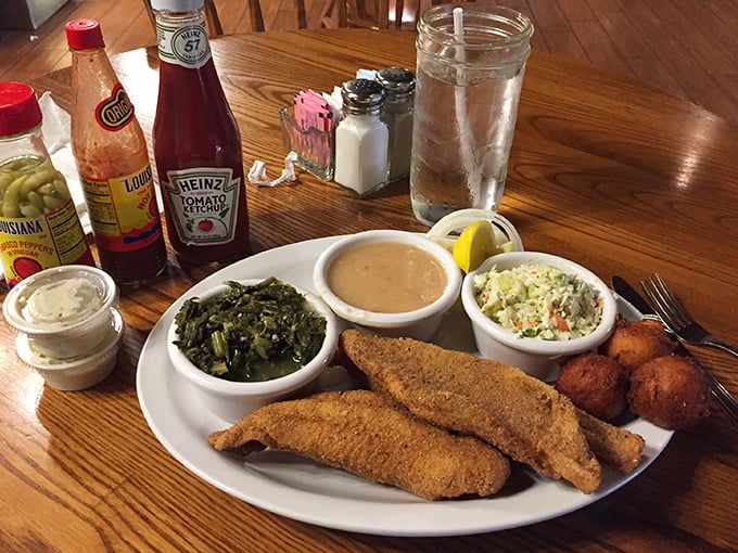 The star of the show: golden-brown catfish with all the fixings. This plate isn't just a meal – it's a Tennessee tradition on display.