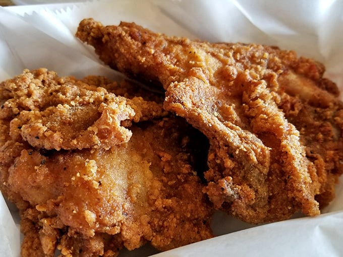 Behold the star of the show—golden-brown perfection with a crust that shatters just right. This chicken doesn't just speak, it sings.