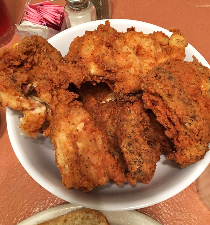 Golden-brown perfection that makes Colonel Sanders look like an amateur. This chicken doesn't just set the bar – it is the bar.