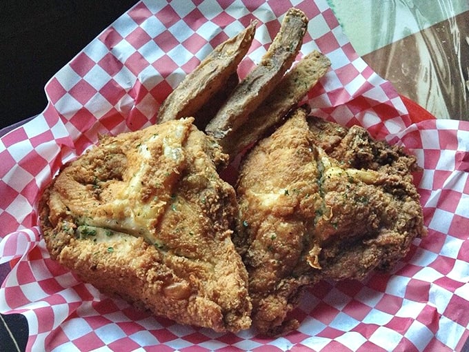 Golden-brown perfection on a red checkered basket – this fried chicken doesn't need fancy plating when it tastes like your childhood dreams.