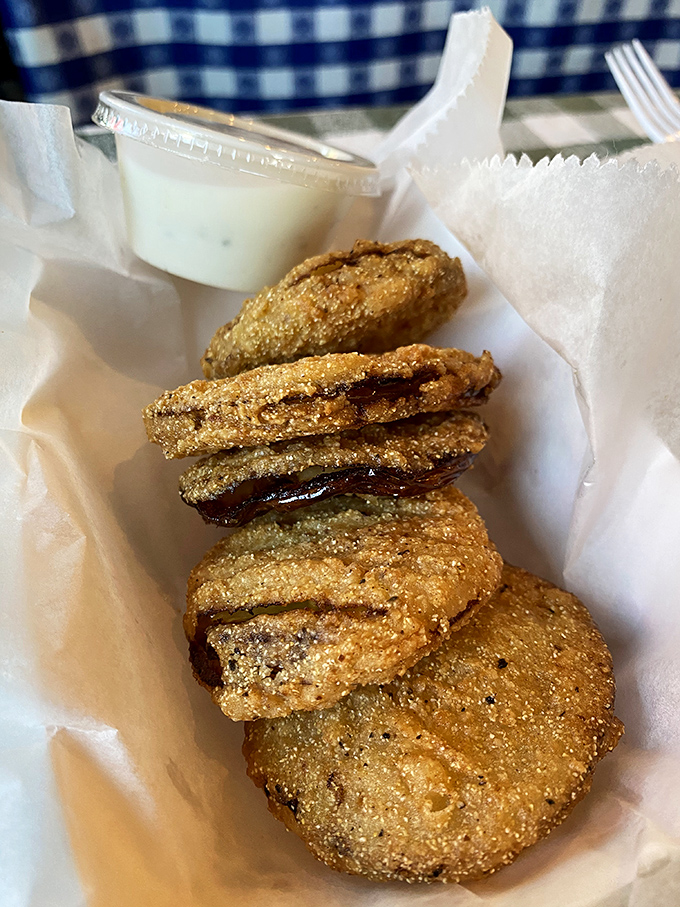 Golden-brown discs of tangy perfection. These fried green tomatoes aren't just a side dish – they're the unsung heroes of Southern cuisine.