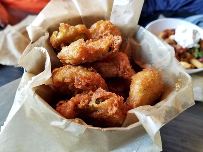 Golden-fried pickle perfection that shatters with a satisfying crunch before revealing that tangy, juicy center. Worth the trip alone!