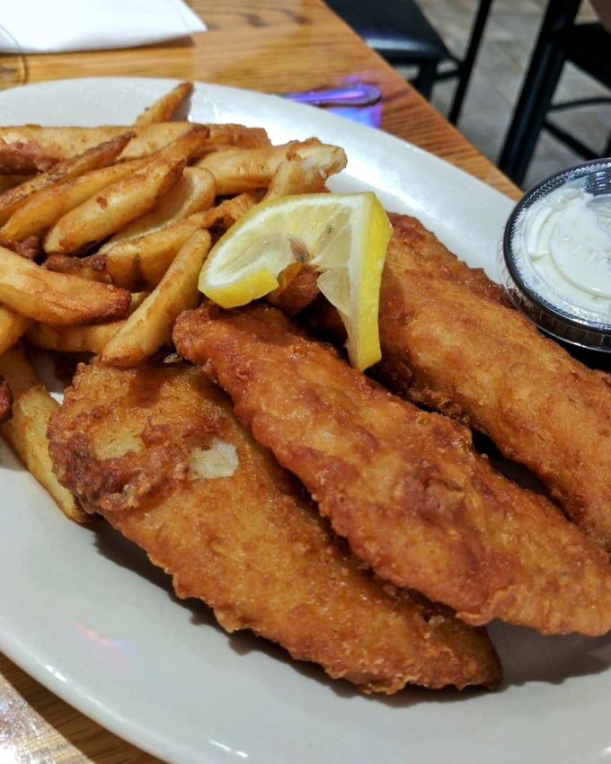 Golden-brown perfection on a plate. This walleye achieves that mythical balance—shatteringly crisp exterior giving way to flaky, tender fish that practically melts on your tongue.