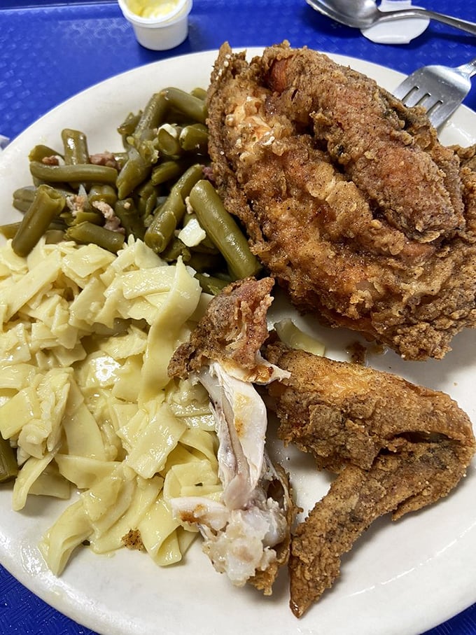 Golden-brown fried chicken that makes you question if you've ever truly experienced fried chicken before. The noodles aren't a side—they're a destination.