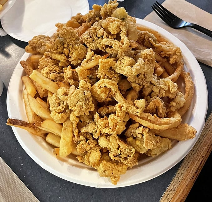 Golden mountains of whole-belly clams atop crispy fries – a plate that has launched a thousand road trips and zero regrets.