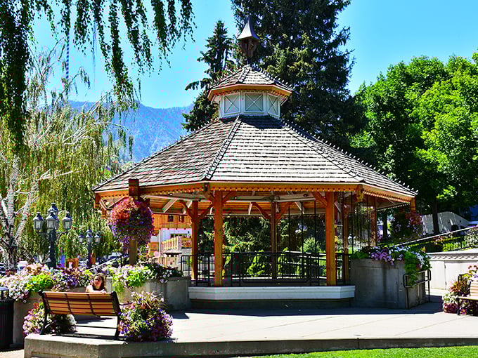 Leavenworth's gazebo sits surrounded by flower beds and mountain views, serving as the town's unofficial "let's meet there" spot for both planned rendezvous and impromptu picnics.