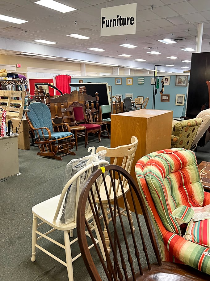 Furniture heaven! That wooden rocker could tell stories, while the colorful cushions nearby are just begging for a second chance at making a home cozy.