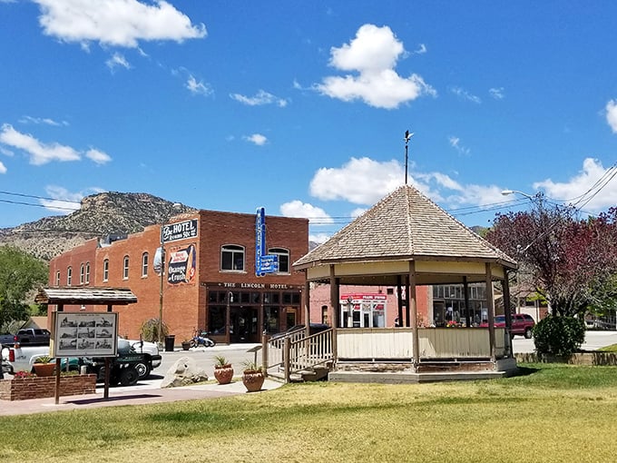 The town square gazebo isn't just charming—it's where community happens, with the Lincoln Hotel standing guard like an old friend watching over the festivities.