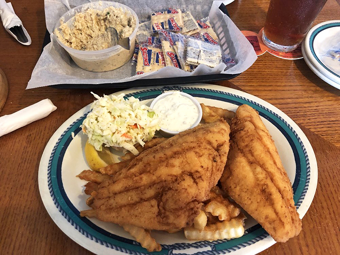 Behold the legendary hogfish platter – golden, crispy perfection that's earned this place its statewide reputation for seafood excellence.