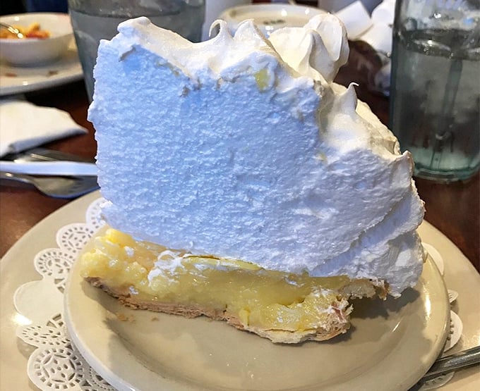 This lemon meringue pie isn't just tall—it's skyscraper ambitious! The meringue peaks reach heights that would make Manhattan jealous.
