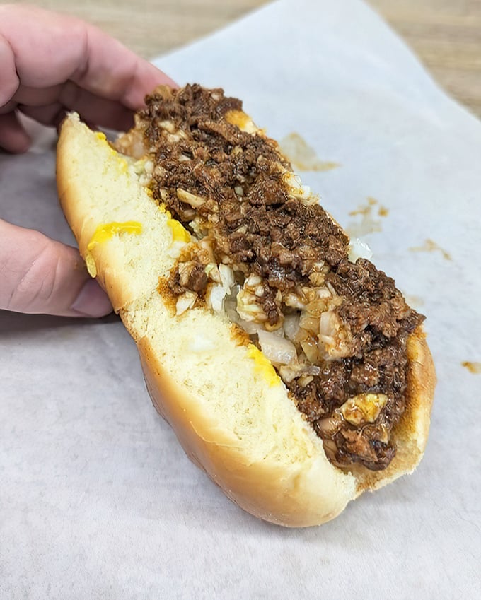 This isn't just a hot dog—it's a Carolina tradition. Topped with homemade chili and nestled in a soft bun, it's comfort food incarnate.