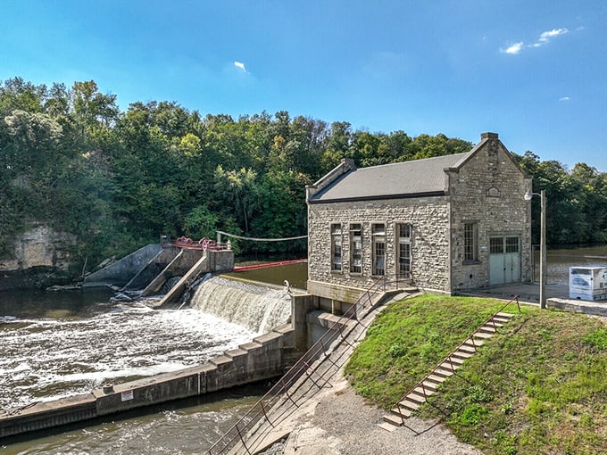 This stone powerhouse by the dam isn't just picturesque—it's Iowa's industrial heritage standing proud against time and current.