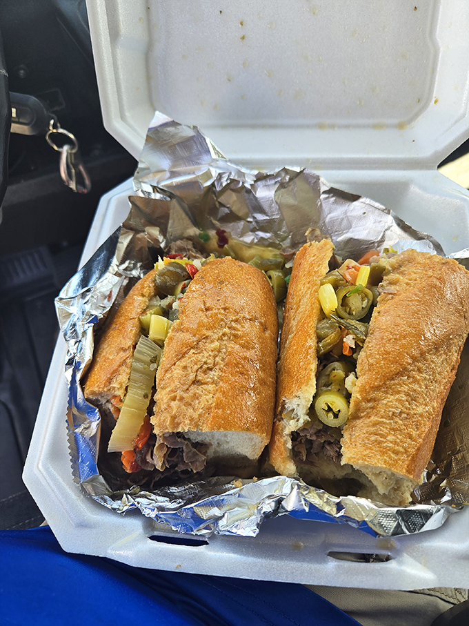 The Italian beef in all its glory—thinly sliced, perfectly seasoned, and nestled in that sturdy roll with giardiniera. This sandwich doesn't just speak to you; it sings.
