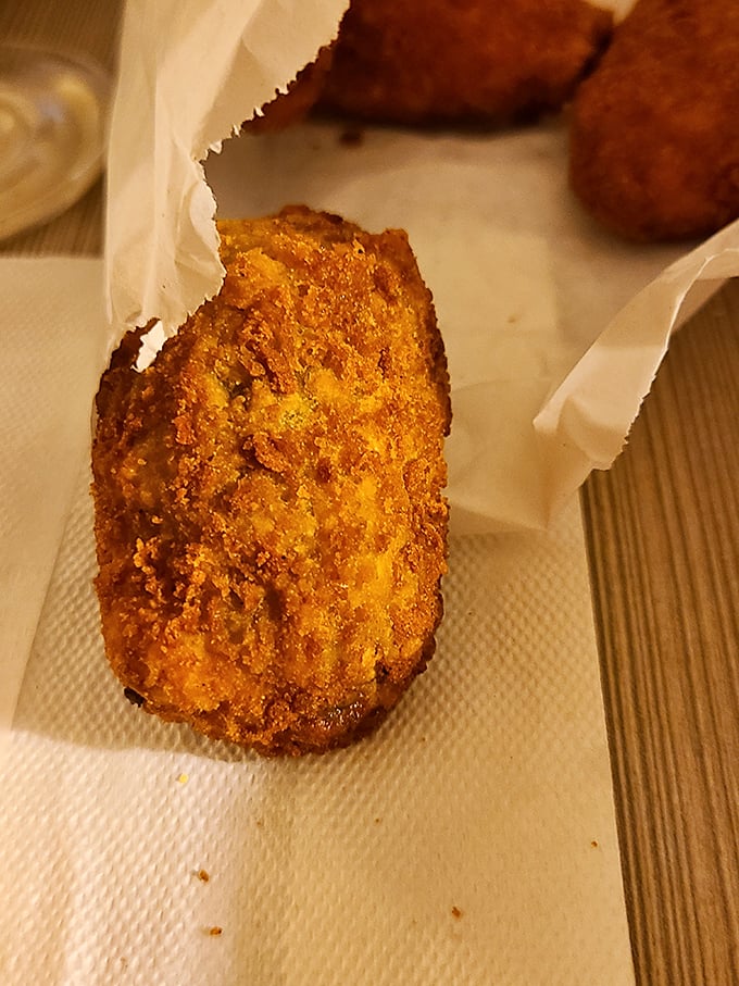 These aren't your average jalapeño poppers; they're golden-armored flavor bombs with the perfect crisp-to-cream ratio that'll make you question all poppers past.