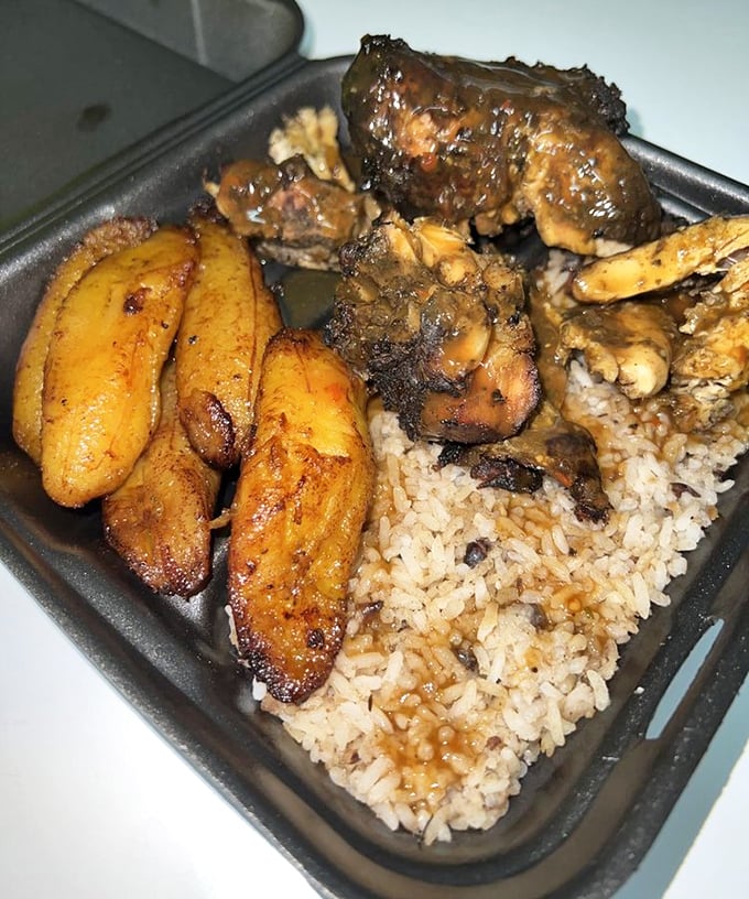 Jerk chicken with plantains and rice and peas—a holy trinity of Jamaican cuisine that might just make you speak with an accent for the rest of the day.