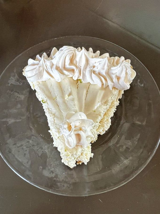 The legendary Key lime pie in all its glory – pale yellow perfection crowned with clouds of whipped cream. Worth every mile of the drive.
