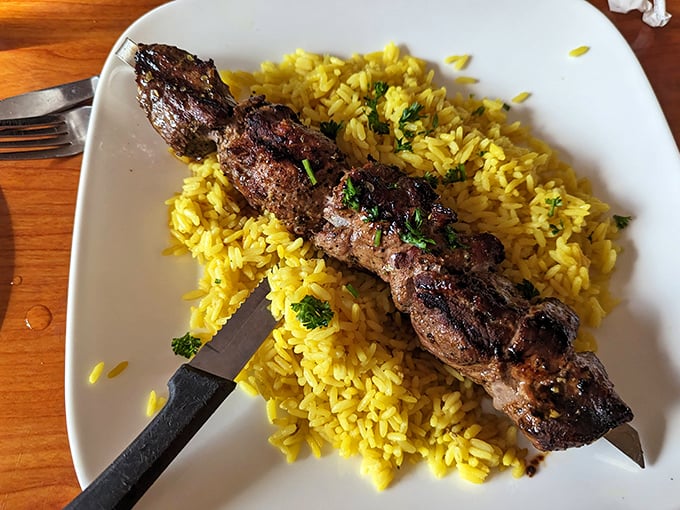 This lamb kebab isn't just grilled—it's transformed. Perfectly charred exterior, juicy interior, and yellow rice that's anything but an afterthought.