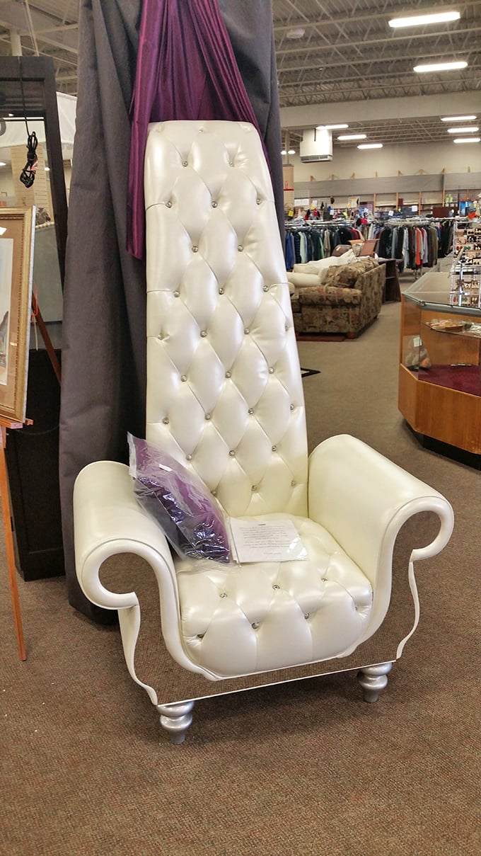 This regal white throne isn't just a chair—it's someone's future statement piece, complete with royal tufting and aristocratic arms.