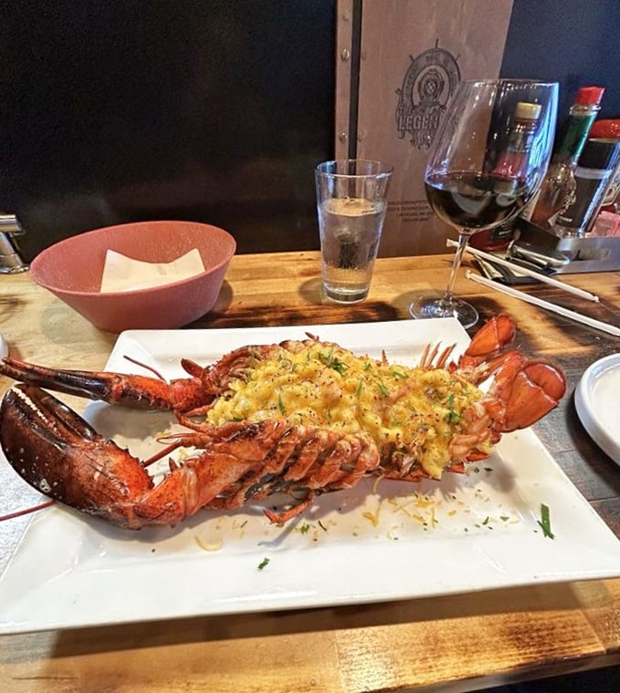 This isn't just lobster—it's a crustacean masterpiece. Perfectly split and topped with a golden crown of savory goodness that would make Neptune himself jealous.
