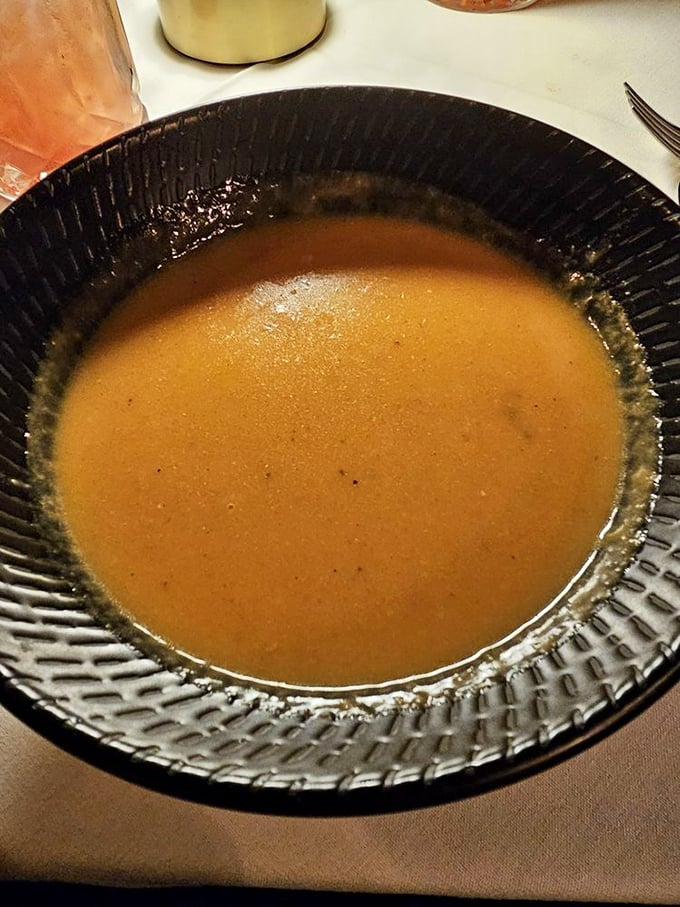 This Lobster Bisque isn't just soup—it's a silky, sherry-kissed ocean of flavor that makes you wonder why anyone bothers with solid food.