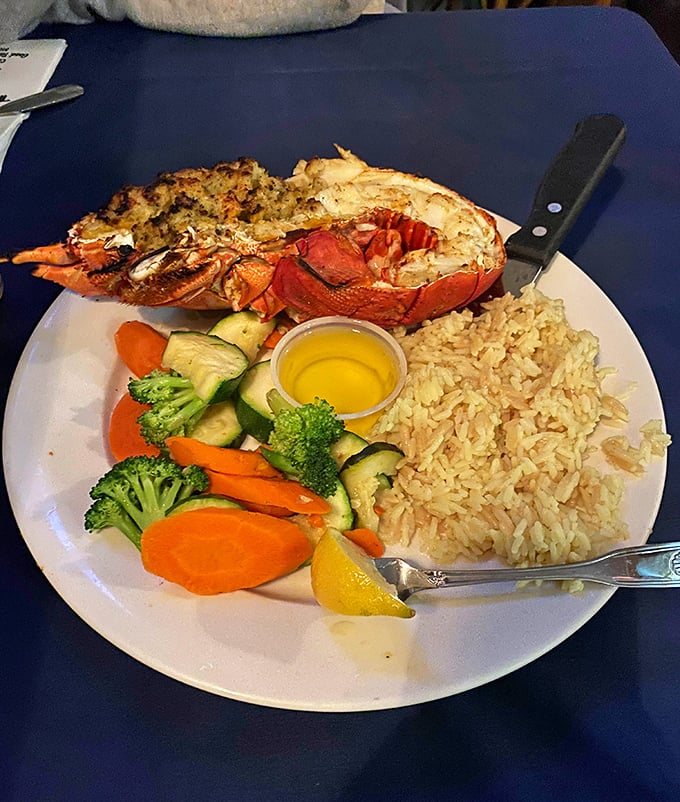 Split lobster served with the respect it deserves—simply prepared to let its natural sweetness shine. That drawn butter? Liquid gold for dipping.