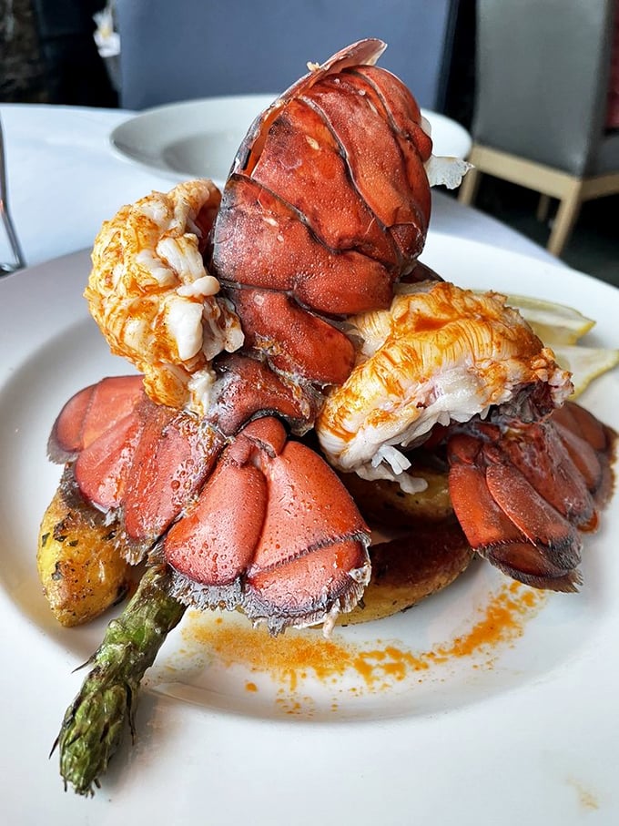 Lobster this perfectly prepared doesn't just make your mouth water—it makes your eyes tear up with joy. Ocean royalty served on a throne of asparagus.