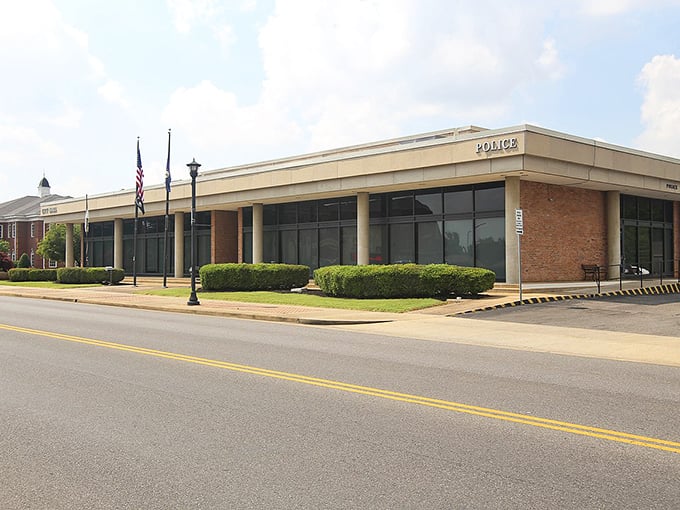 Mayfield's City Hall embodies the practical, no-nonsense approach that keeps municipal services affordable. Clean lines and functional design reflect the town's commitment to efficiency without extravagance.