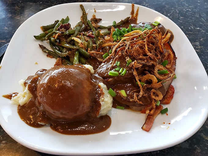 Behold the star of our show: meatloaf wrapped in bacon and bathed in Shiner Bock gravy. This isn't your grandmother's recipe—unless your grandmother was a culinary genius.