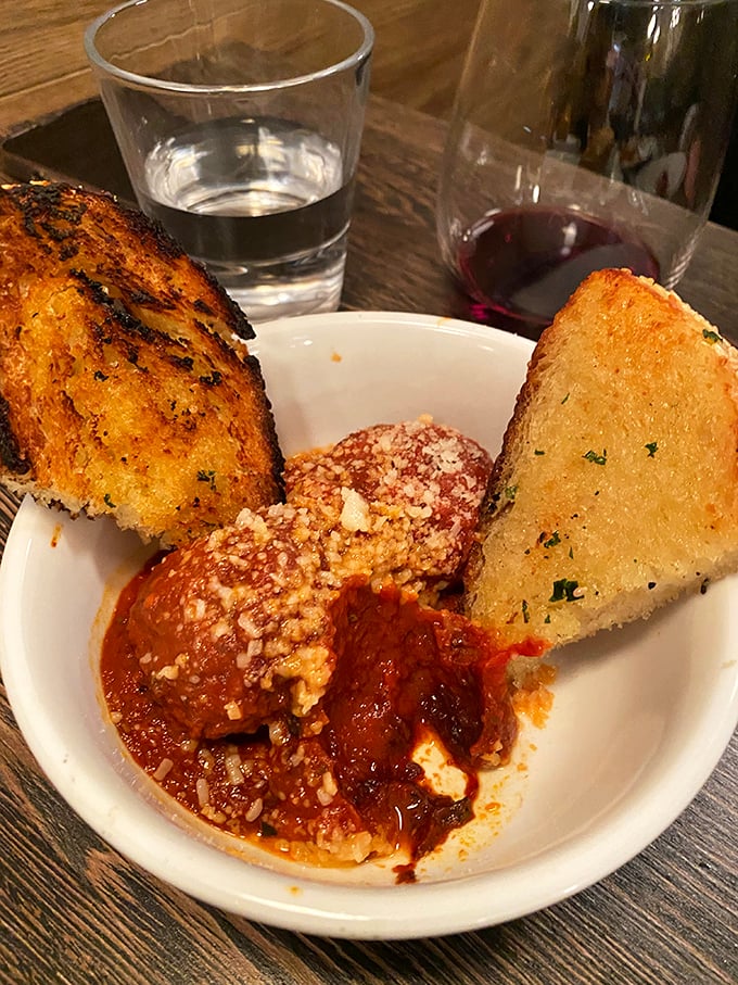 The legendary meatballs that launched a thousand road trips. Nestled in rich tomato sauce with crusty bread for dipping – resistance is futile.