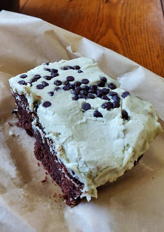 Not all heroes wear capes – some wear cream cheese frosting. This mint-chocolate brownie might just solve all of life's problems.