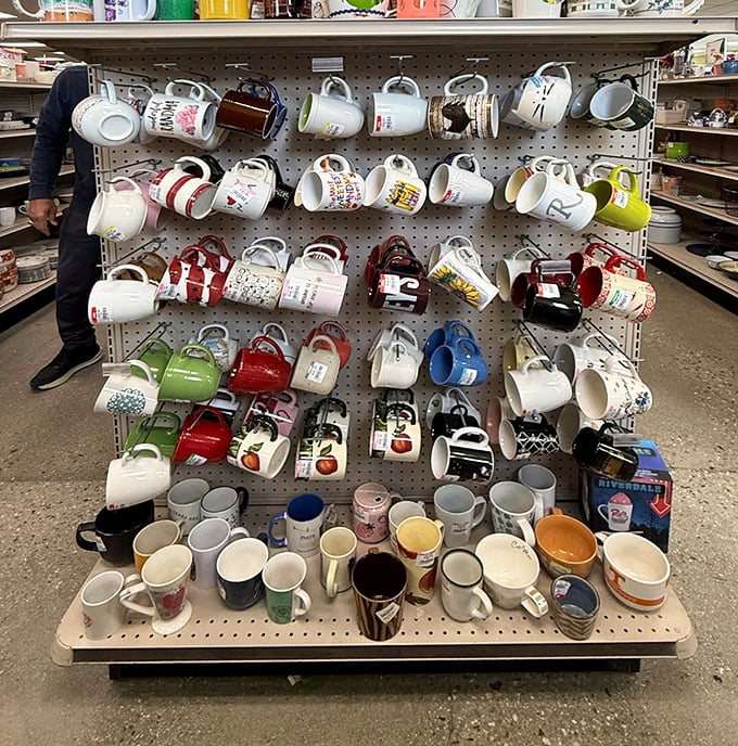 A veritable museum of morning rituals – each mug tells a story of someone's coffee break, vacation memory, or office humor now ready for your kitchen.
