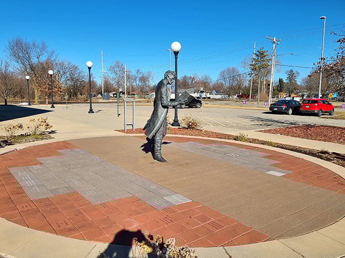 Beyond the wagon, Lincoln stands in bronze contemplation. The town offers multiple ways to commune with Honest Abe—one practical, one fantastical.