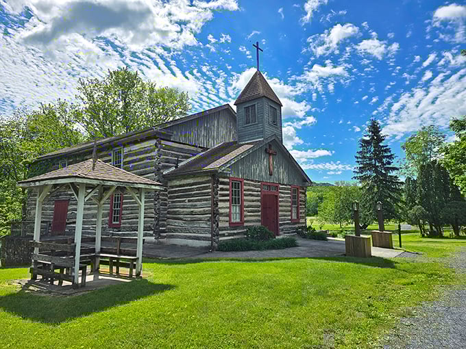 This rustic log church at Old Bedford Village whispers stories of frontier faith, where Sunday best meant your cleanest homespun and sturdiest boots.