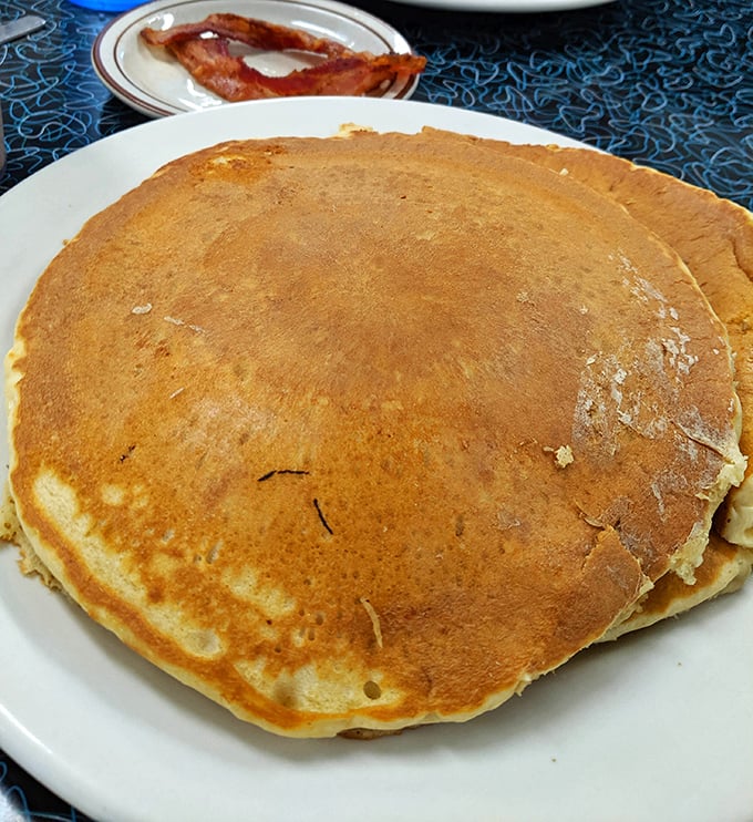 This pancake isn't just big – it's the size of a vinyl record and twice as satisfying. The kind that makes you want to cancel your plans for the day.