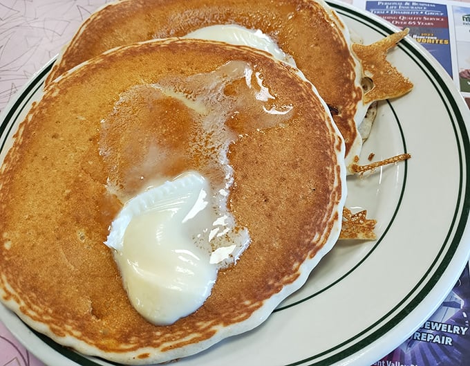 Golden pancakes with melting butter—the breakfast equivalent of a warm hug. Simple perfection that needs no Instagram filter.