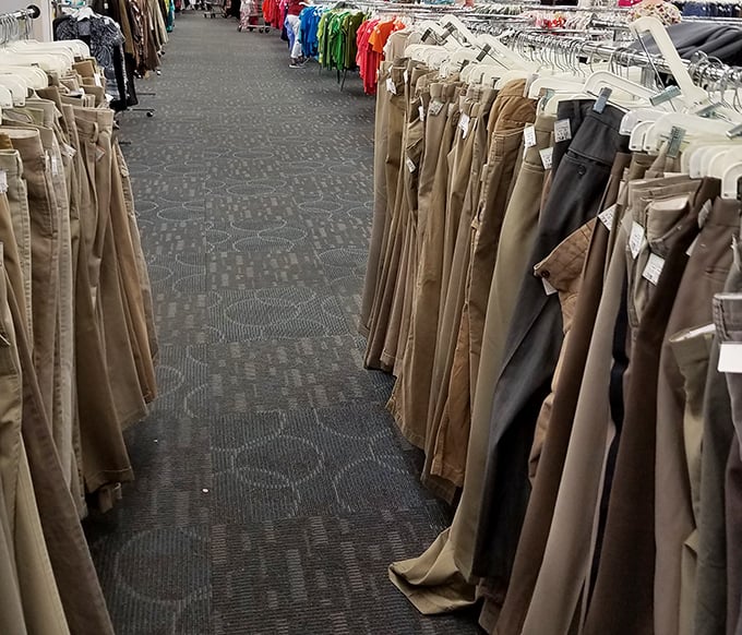 The pants section stretches like an Oklahoma horizon—khakis, dress slacks, and jeans organized so you're not hunting blindly.