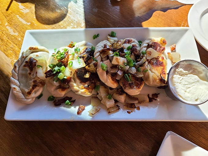 These pierogies aren't just good—they're tell-your-friends, plan-your-next-visit, dream-about-them-at-night good. Perfectly golden with caramelized onions and a side of nostalgia.