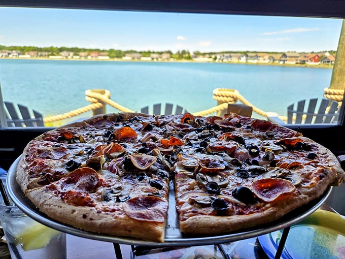 Pizza perfection with a water view – pepperoni, olives, and cheese melted to bubbly bliss. Some meals are worth traveling for; this is definitely one of them.
